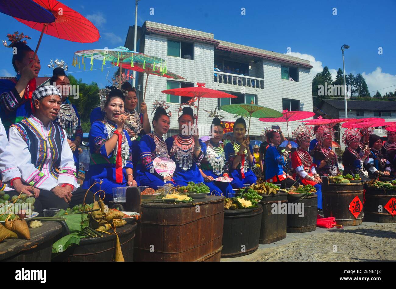 Chinese people of Dong ethnic group dressed in traditional costumes ...