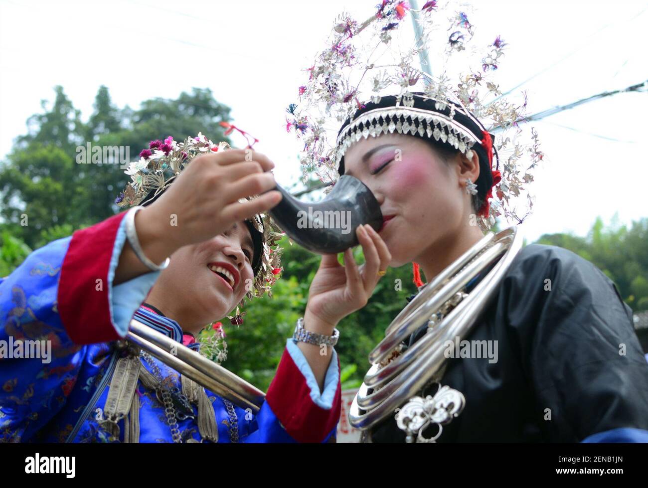 Chinese people of Dong ethnic group dressed in traditional costumes ...