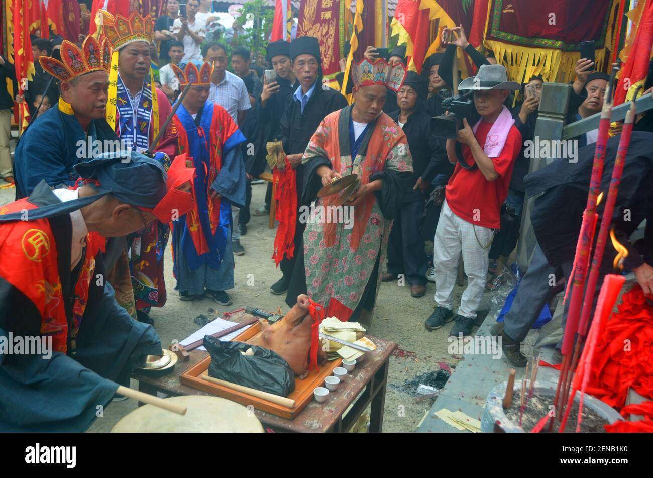 Chinese people of Dong ethnic group dressed in traditional costumes ...