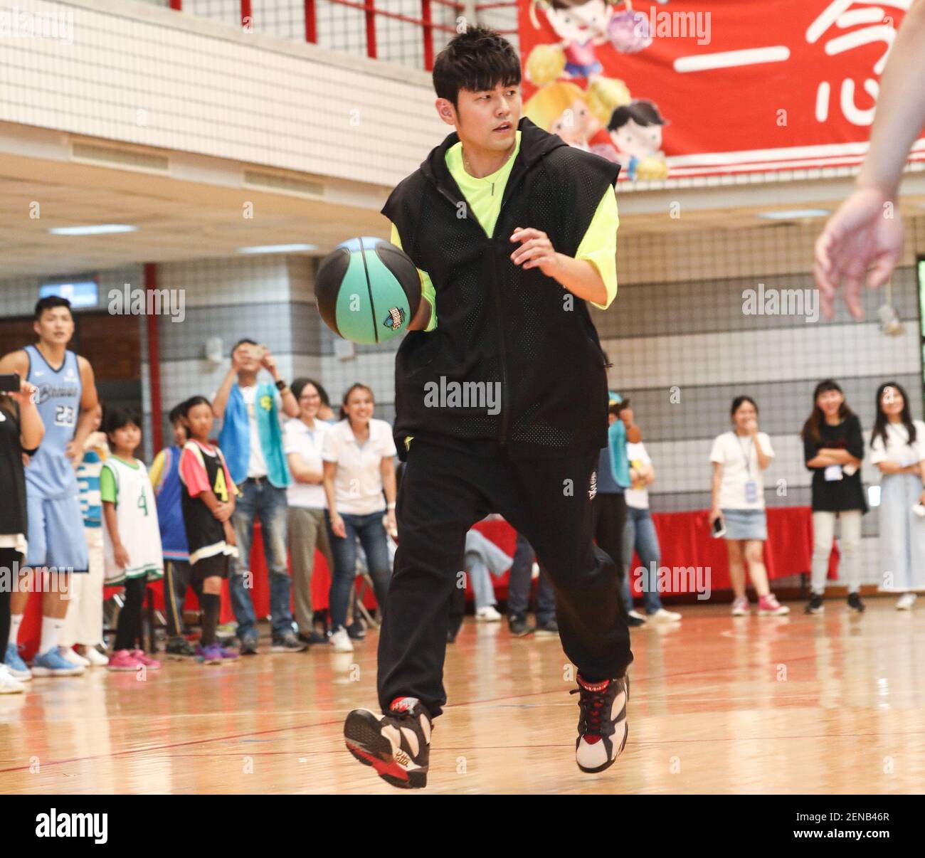 Taiwanese singer and actor Jay Chou attends a public service event in ...