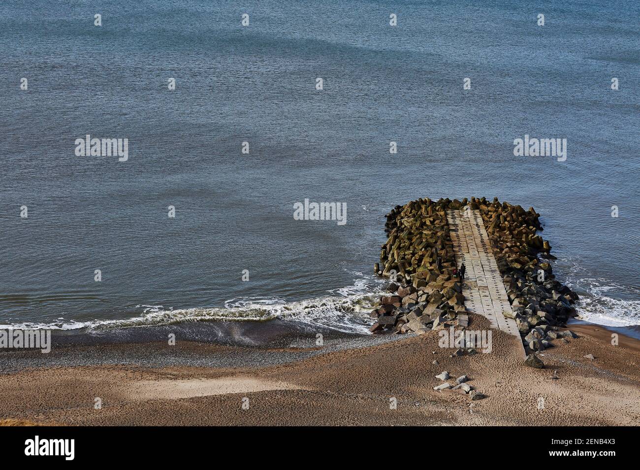 A bathing jetty in the blue ocean Stock Photo - Alamy