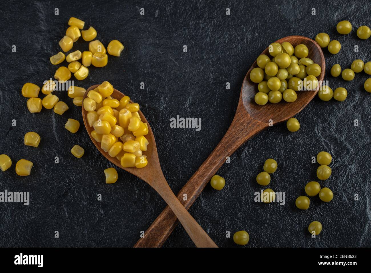 Close up photo of canned corn seeds and green olives Stock Photo - Alamy