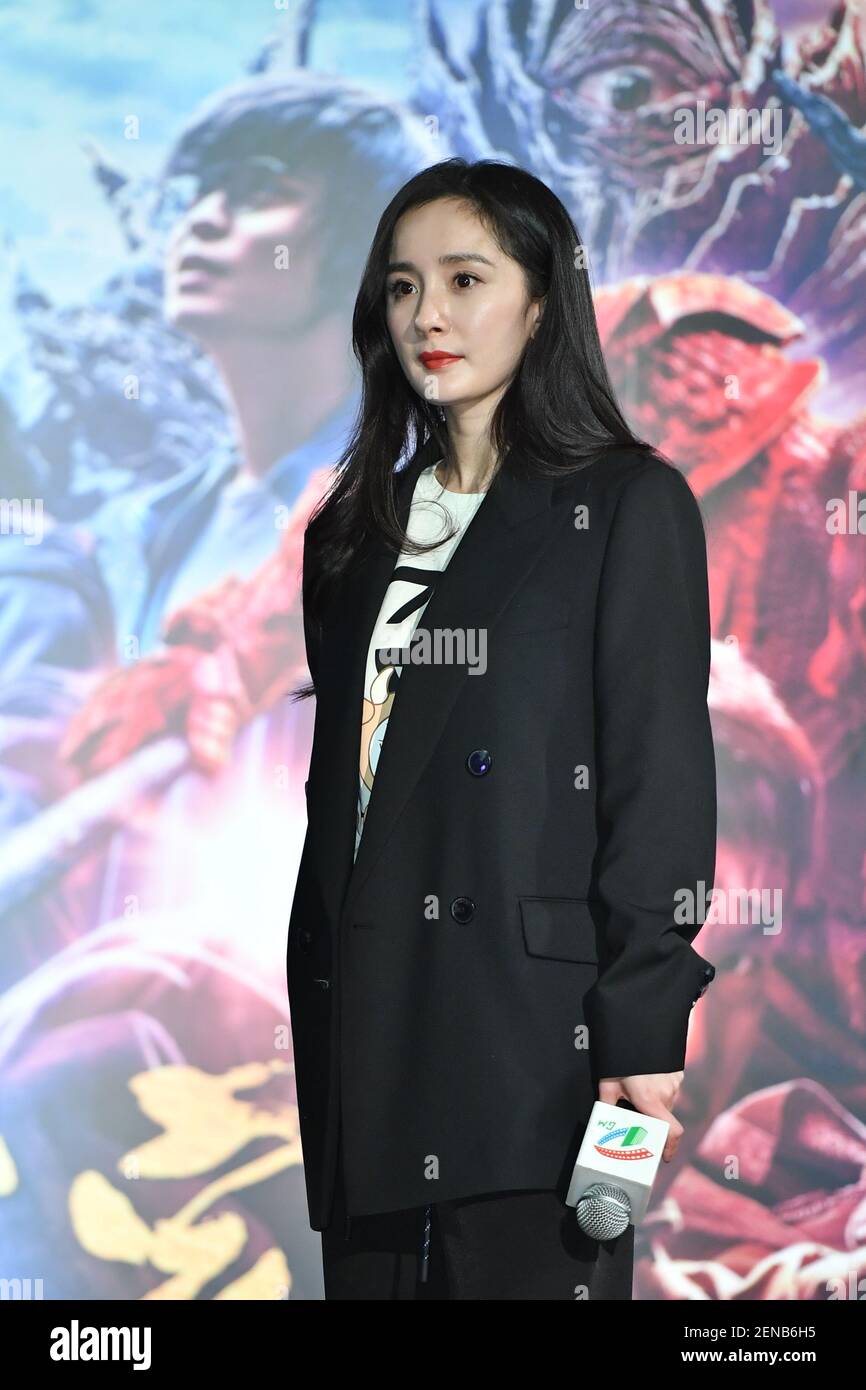 Chinese actress and singer Yang Mi, dressing in a black suit, attends a ...