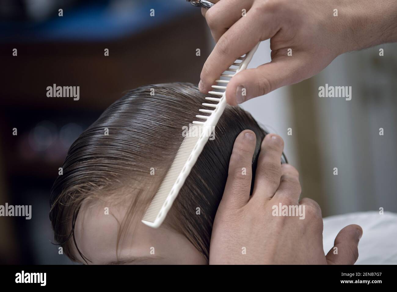 Close Up of a Comb Being Used By a Barber Stock Photo - Alamy