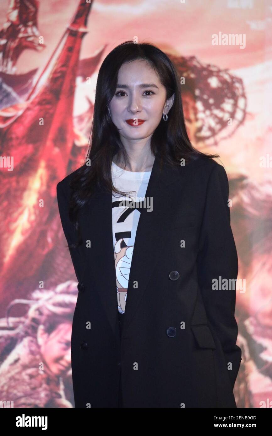 Chinese actress and singer Yang Mi, dressing in a black suit, attends a ...