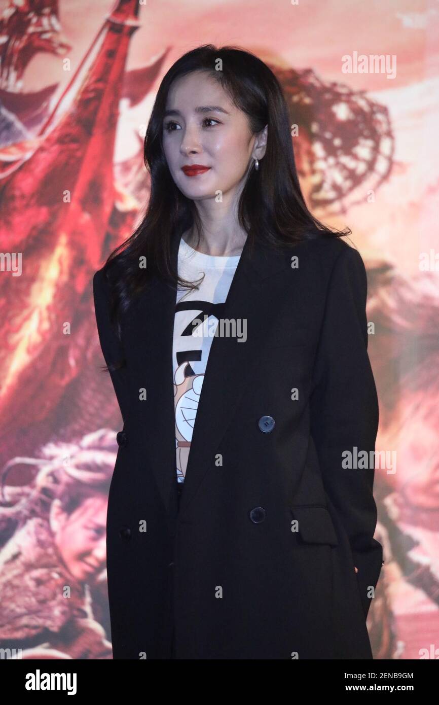 Chinese actress and singer Yang Mi, dressing in a black suit, attends a ...