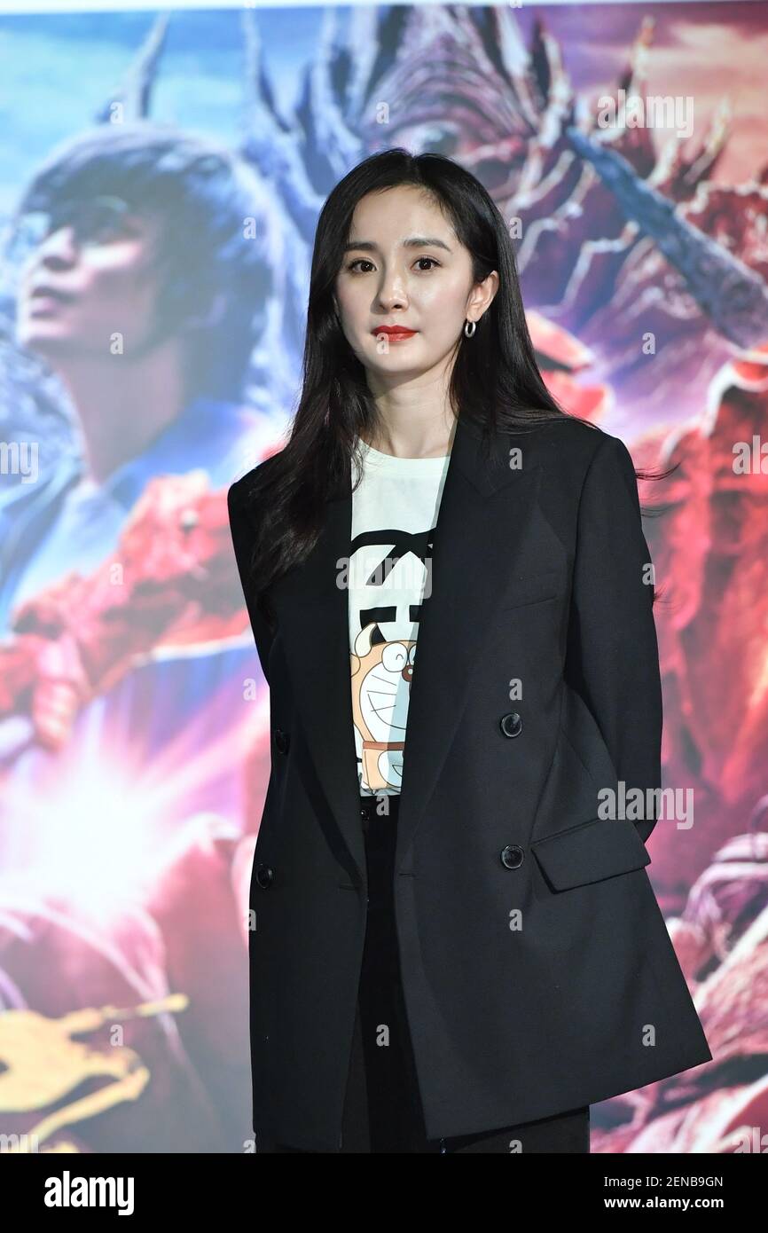 Chinese actress and singer Yang Mi, dressing in a black suit, attends a ...
