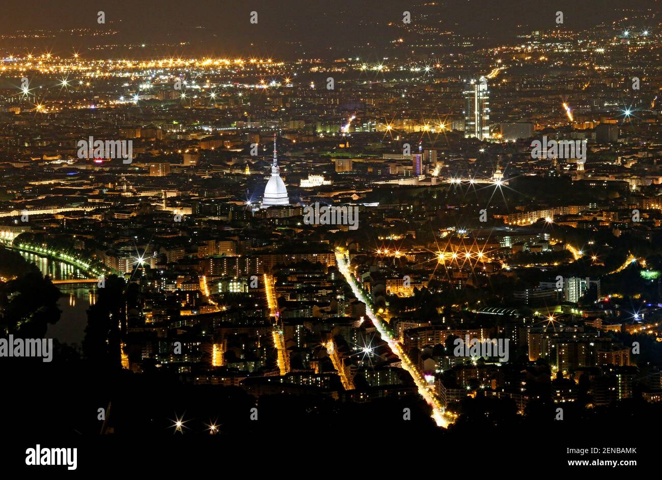 lights of the city of turin in Italy seen from above and the big Dome ...