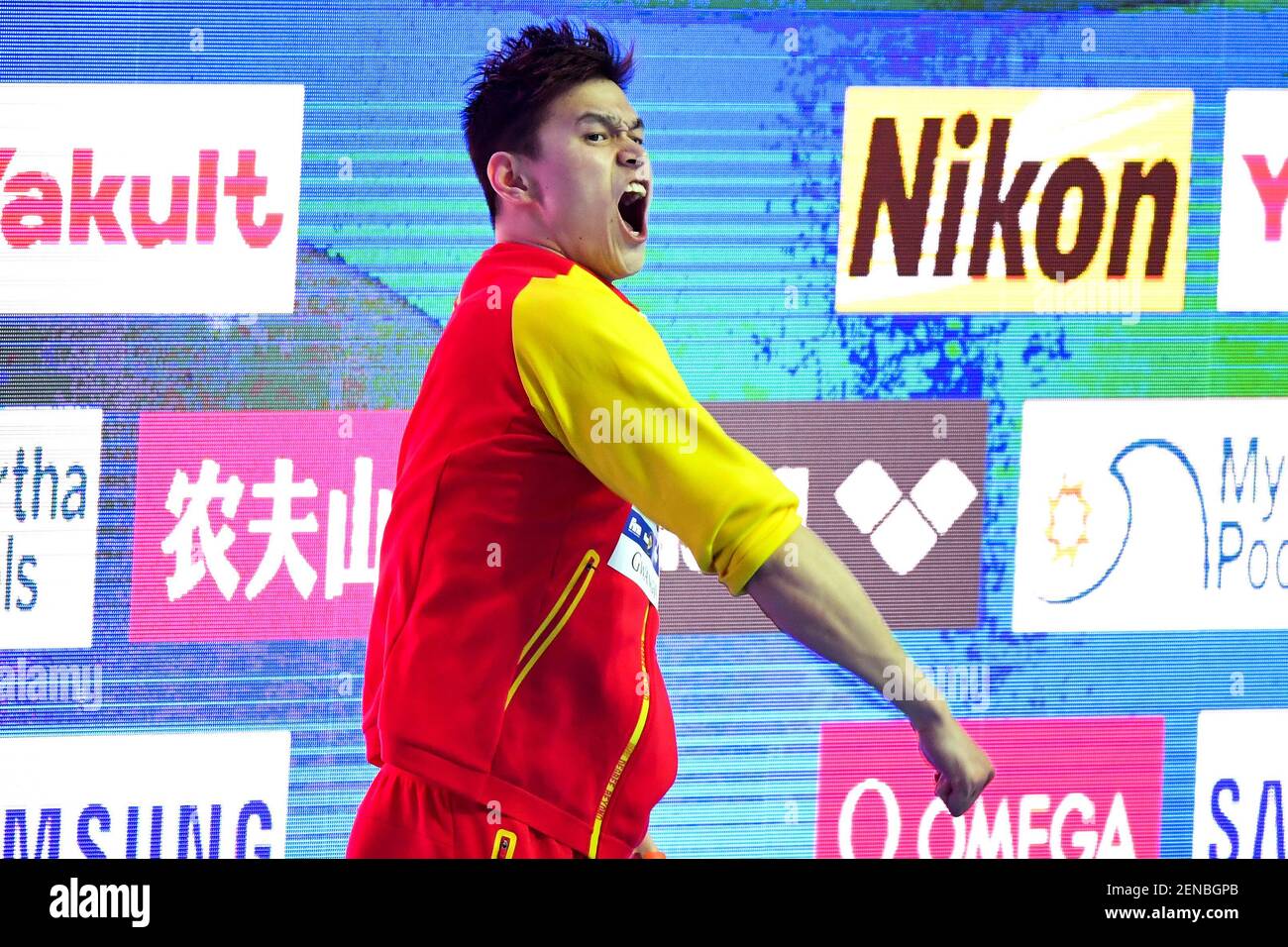 SUN Yang of CHINA celebrates on the podium after winning the men's 400m ...