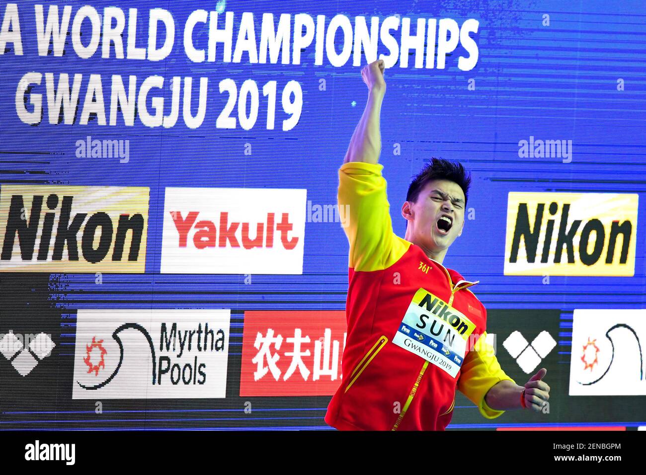 SUN Yang of CHINA celebrates on the podium after winning the men's 400m ...