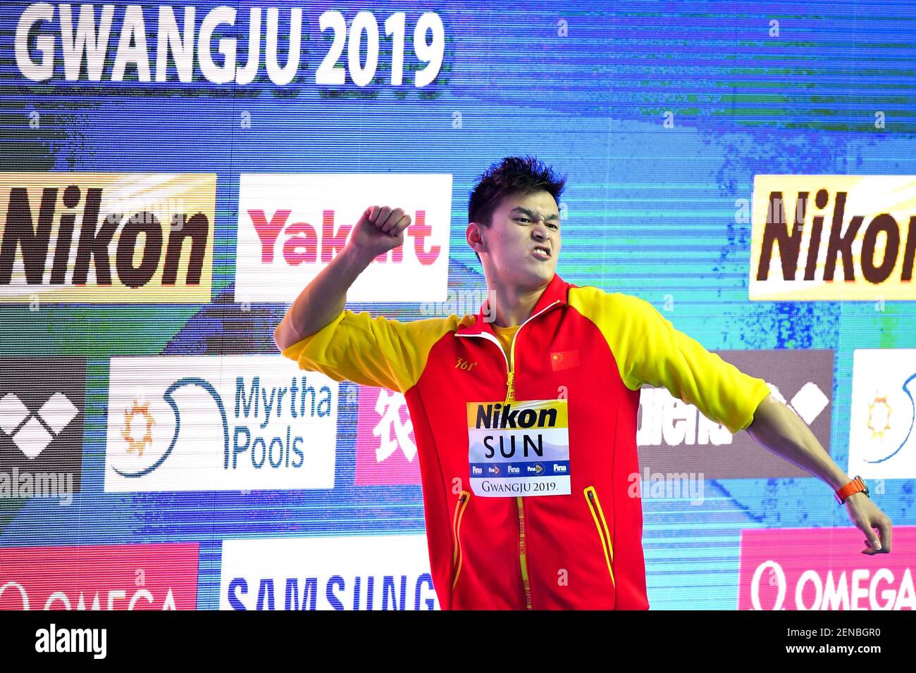 SUN Yang of CHINA celebrates on the podium after winning the men's 400m ...