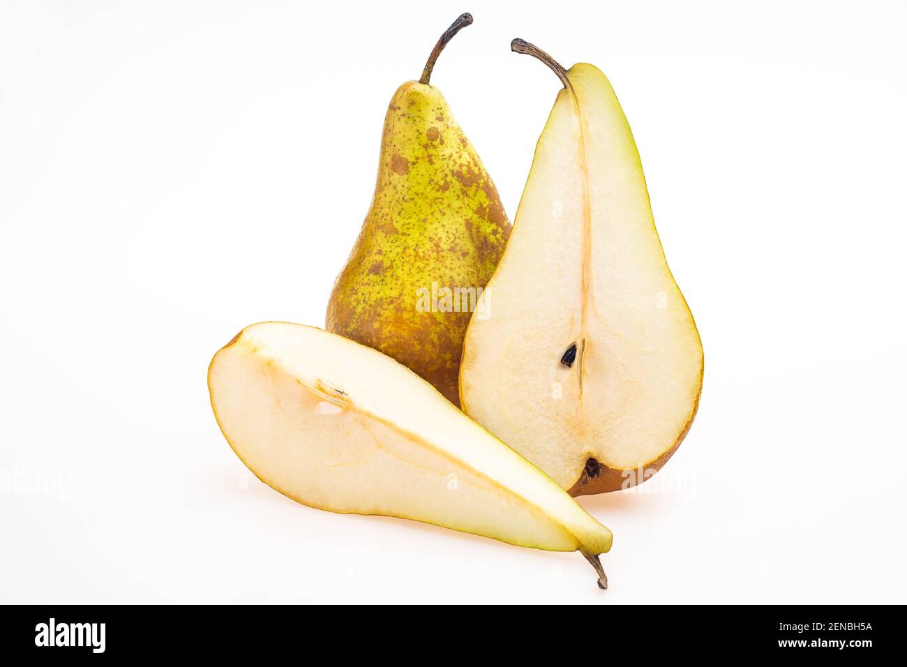 Fresh pears, whole, half and quarter yellow fruit isolated on white ...