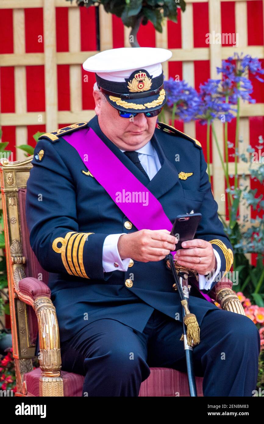 Prince Laurent bored and yawning during the celebration of the Belgian ...