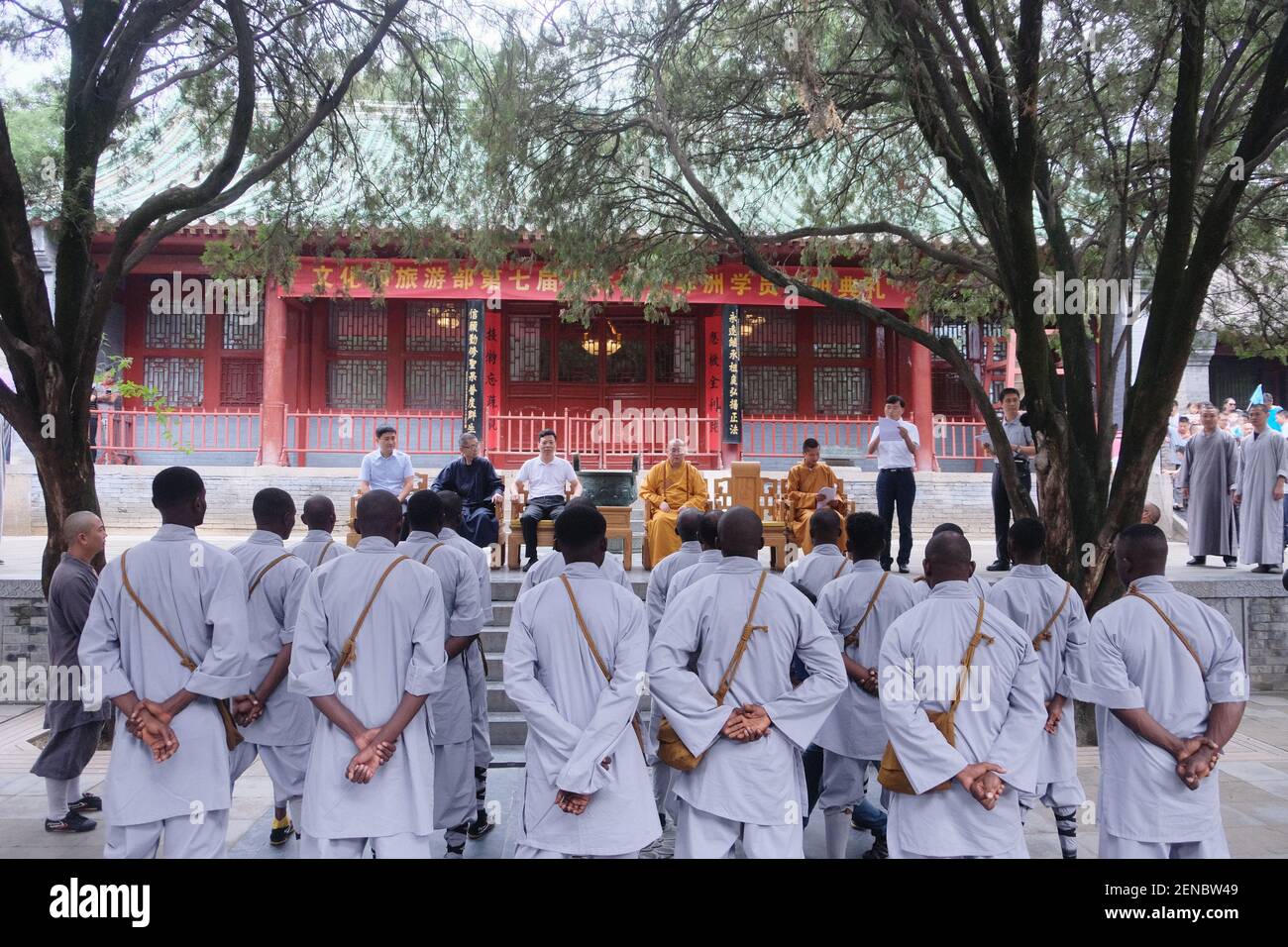 African apprentices listen to speech during the opening ceremony of the ...
