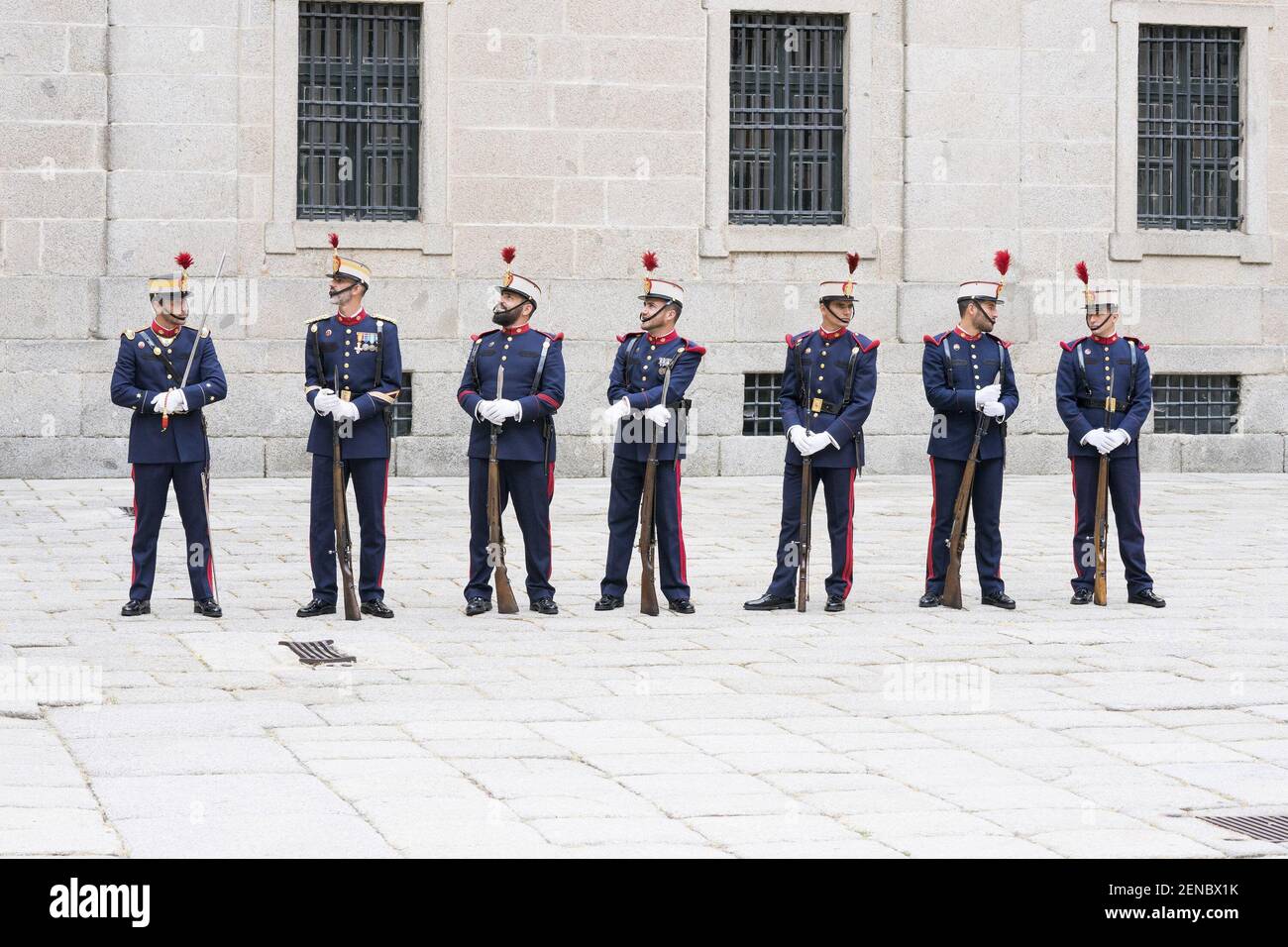 Royal Guard wait for Queen Letizia of Spain in Escorial Monastery. July ...