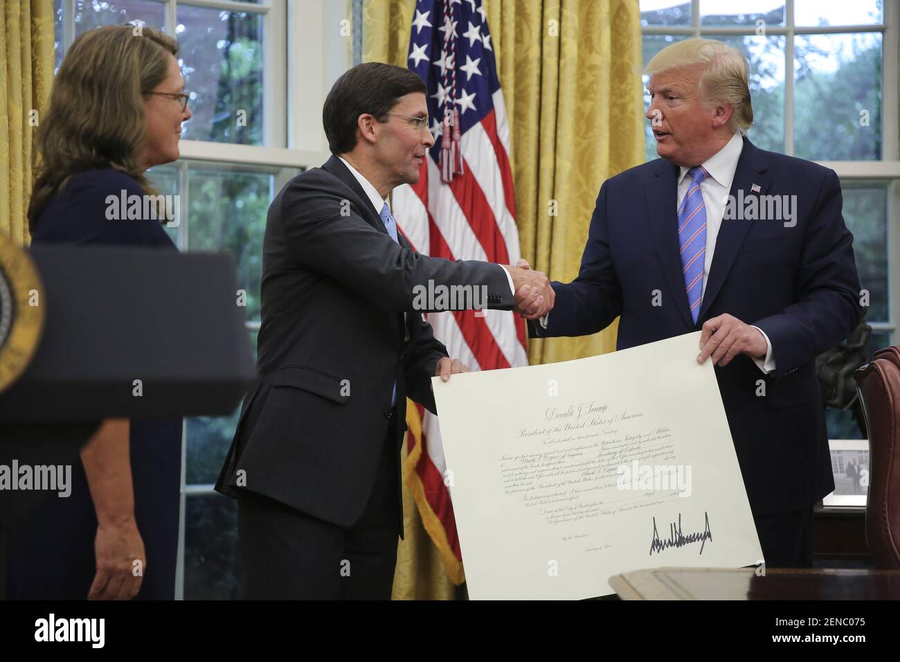 Defense Secretary Mark Esper poses with President Donald Trump and his ...
