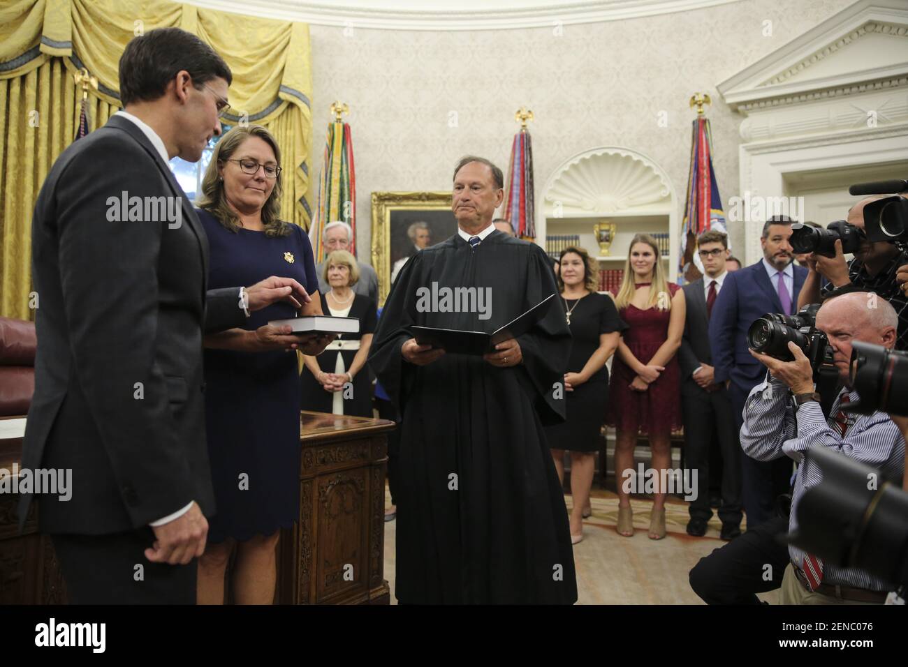 Mark Esper, left, is sworn-in as Defense Secretary by Associate Justice ...
