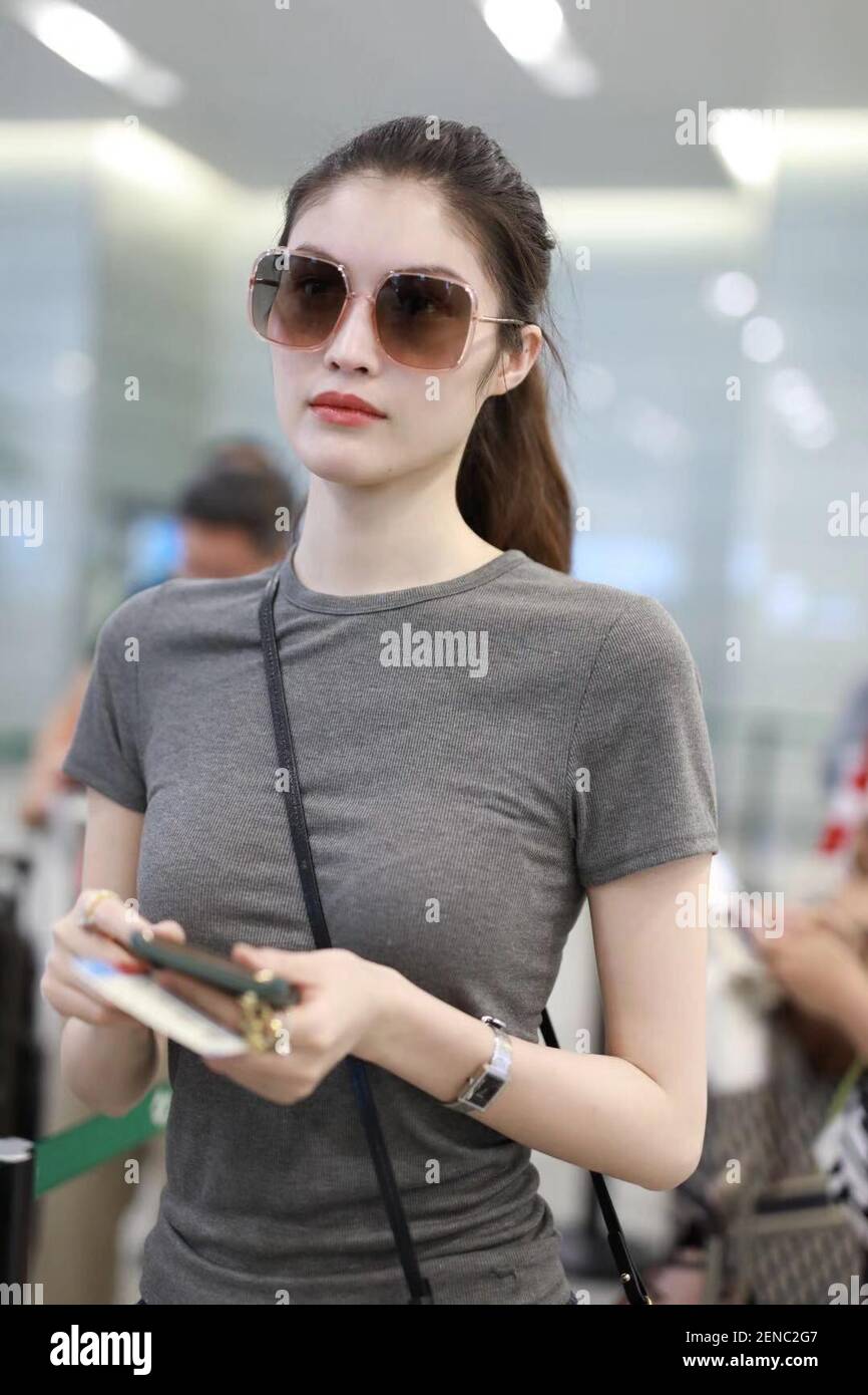 Chinese model He Sui arrives at the Shanghai Hongqiao International ...