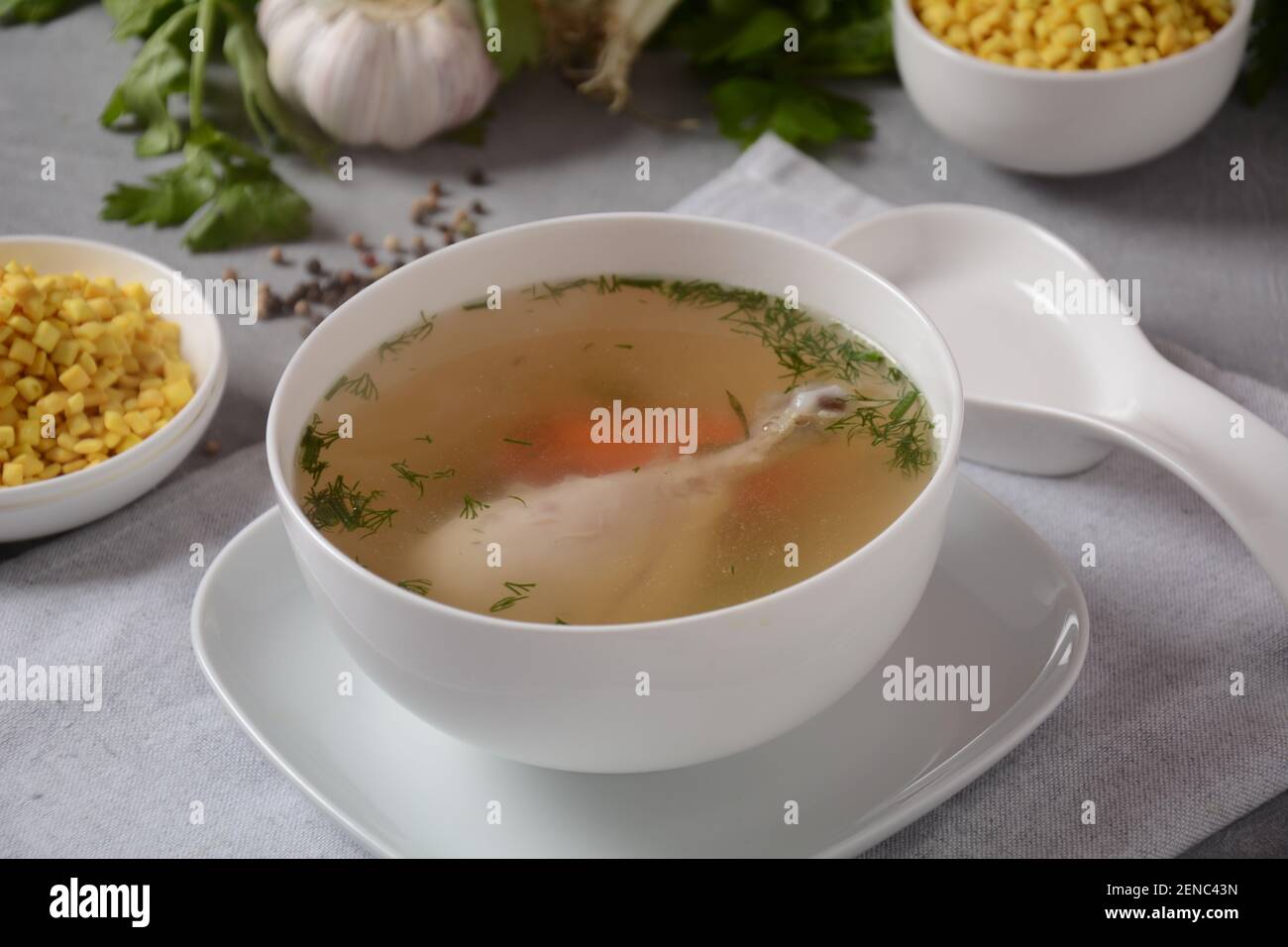 Chicken soup , chicken broth, with pieces of chicken and vegetables and ...