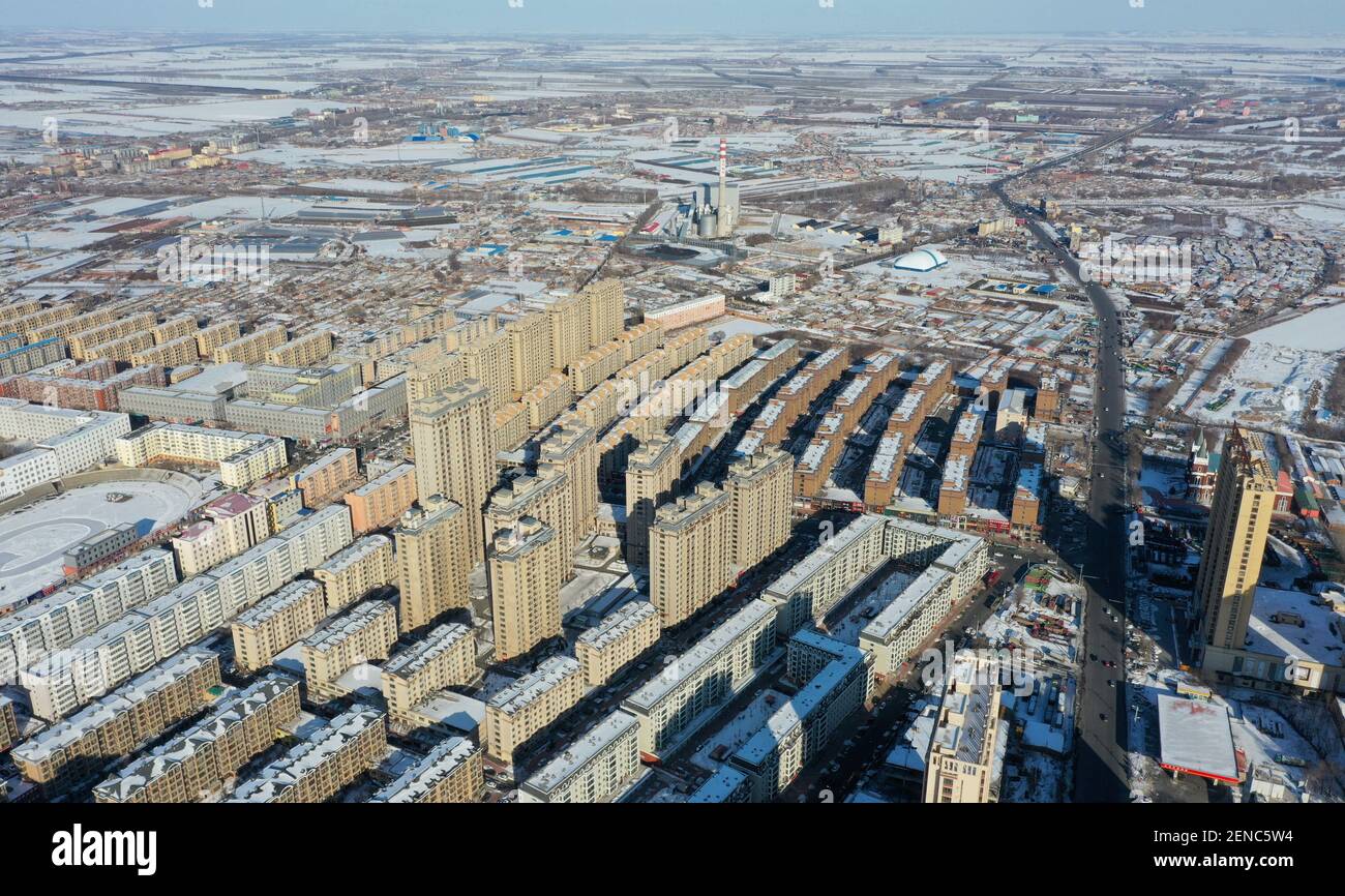 Aerial photos of thesnow-covered Hulan District which is along the ...