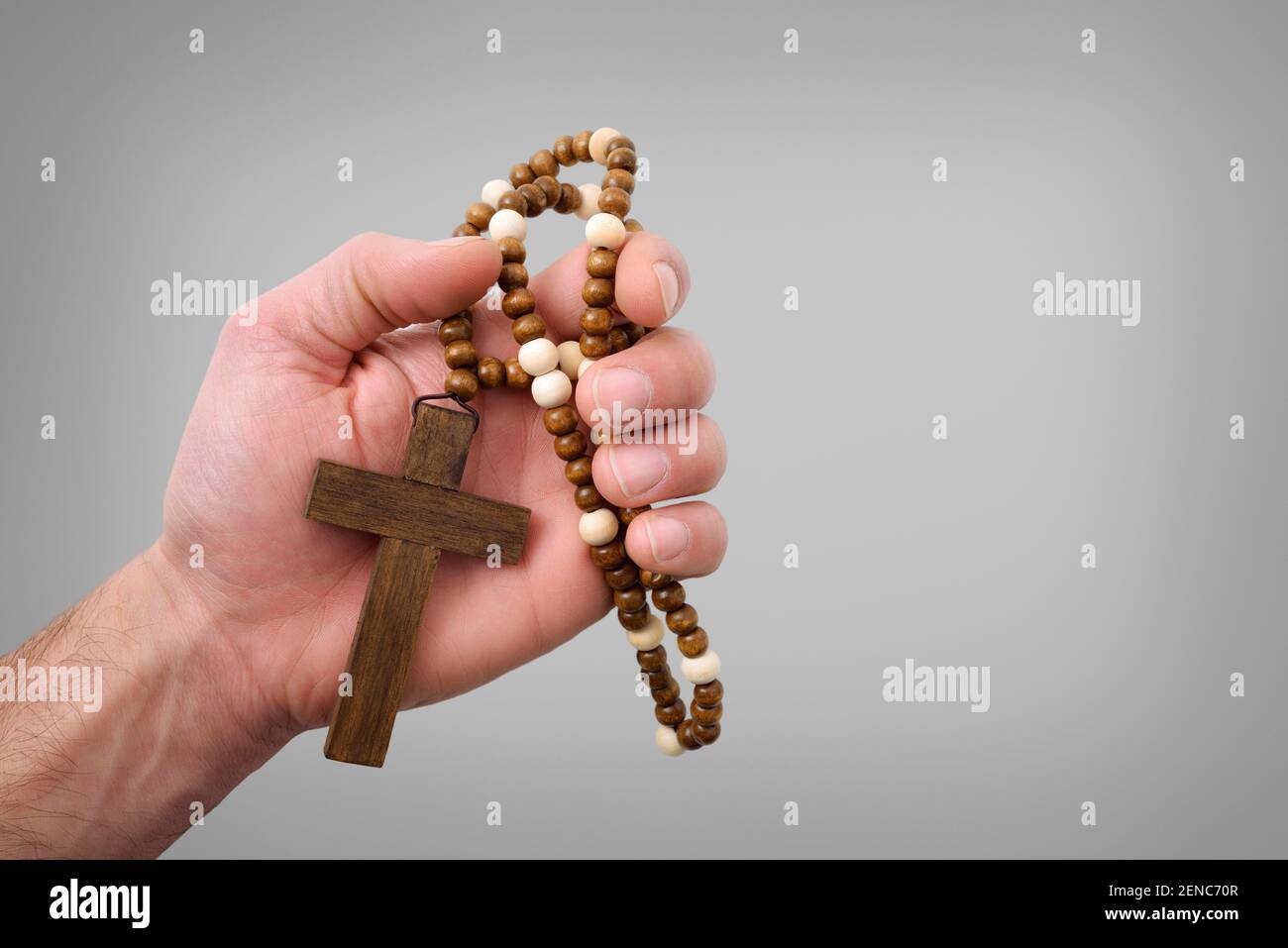 Man holding cross hi-res stock photography and images - Alamy
