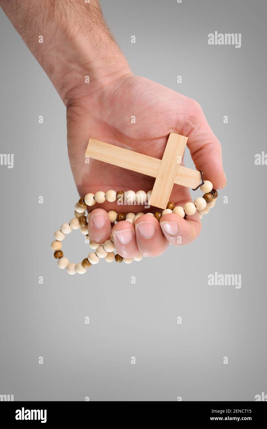 Holding holy cross hi-res stock photography and images - Alamy