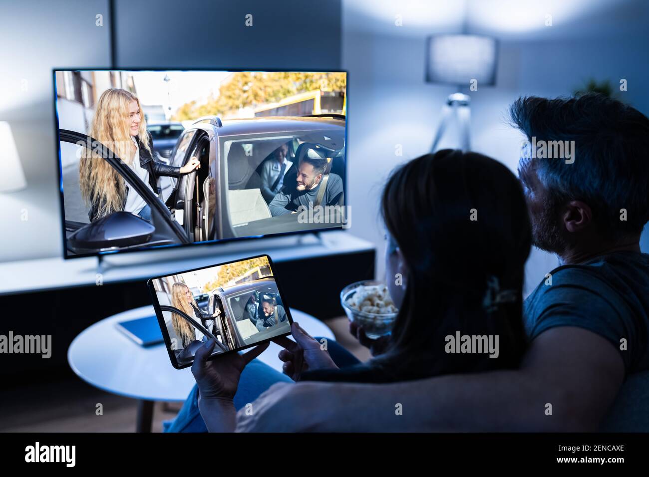 Family Watching TV Through Tablet Television And Movie Streaming Stock ...