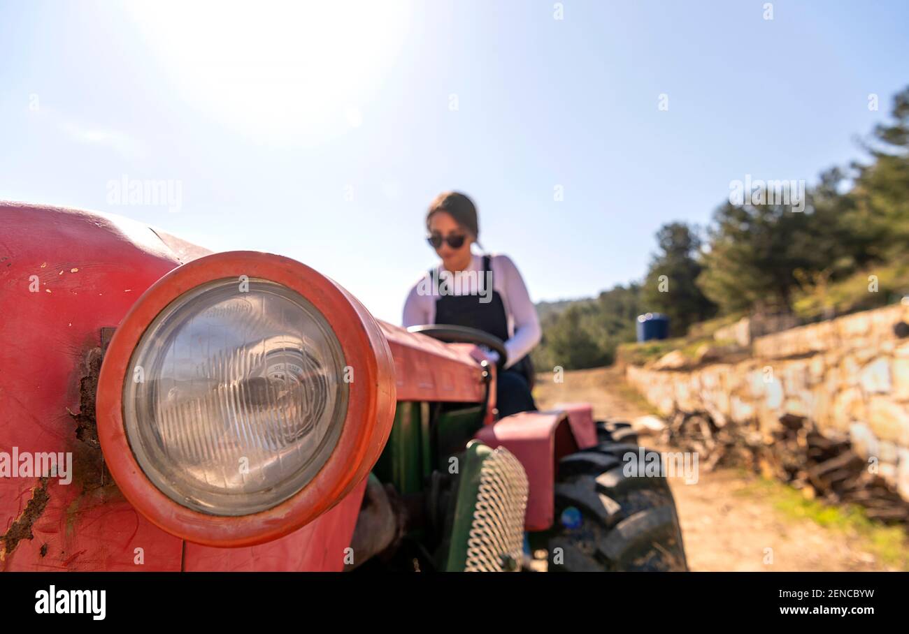 Woman driving tractor hi-res stock photography and images - Alamy