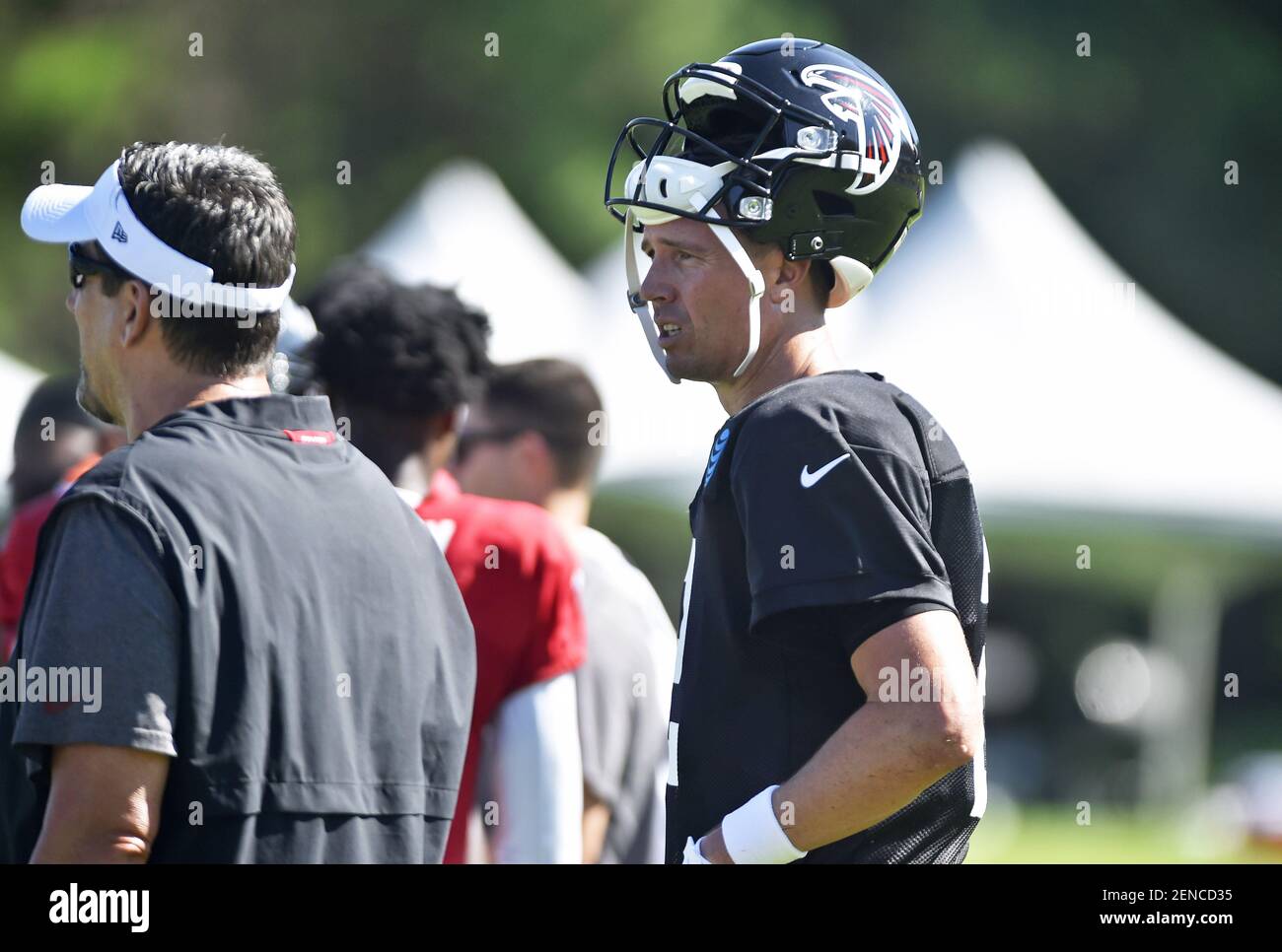 July 24, 2019: Falcons quarterback Matt Ryan (right) watches from the ...