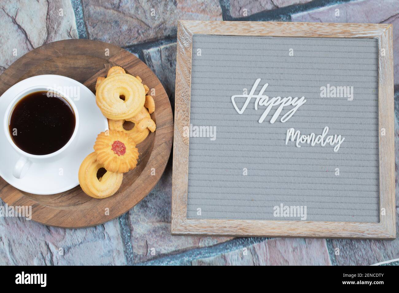 Happy monday poster embedded on grey background with a cup of drink ...