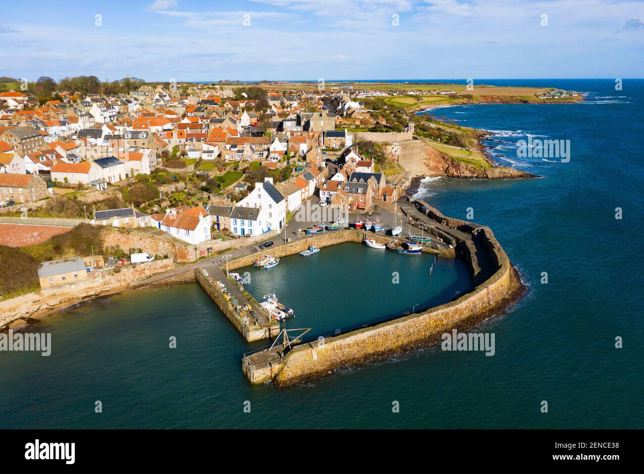 Aerial view of historic village and harbour of Crail in East Neuk of ...
