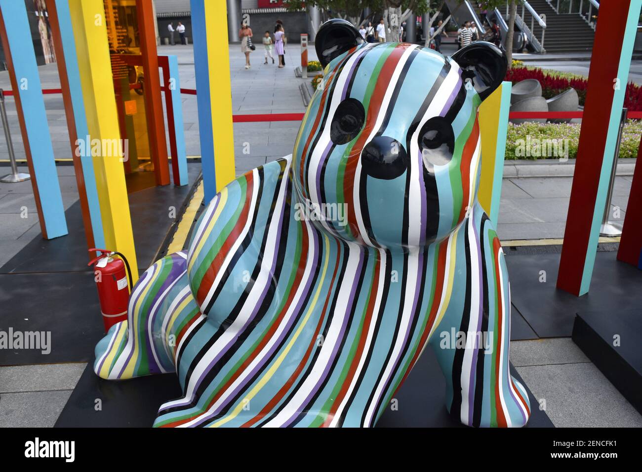 A sculpture featuring the shape of giant panda decorated with coloured ...