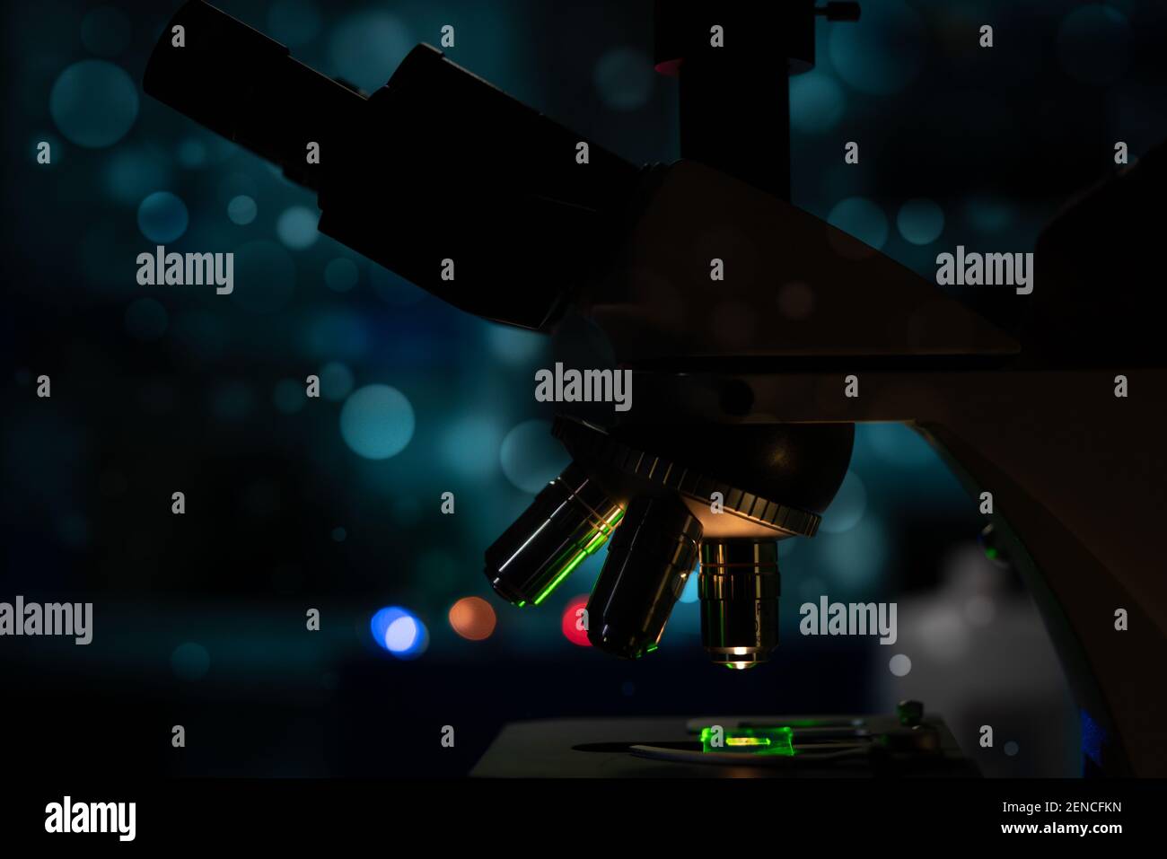 Scientific microscope in dark laboratory Stock Photo - Alamy