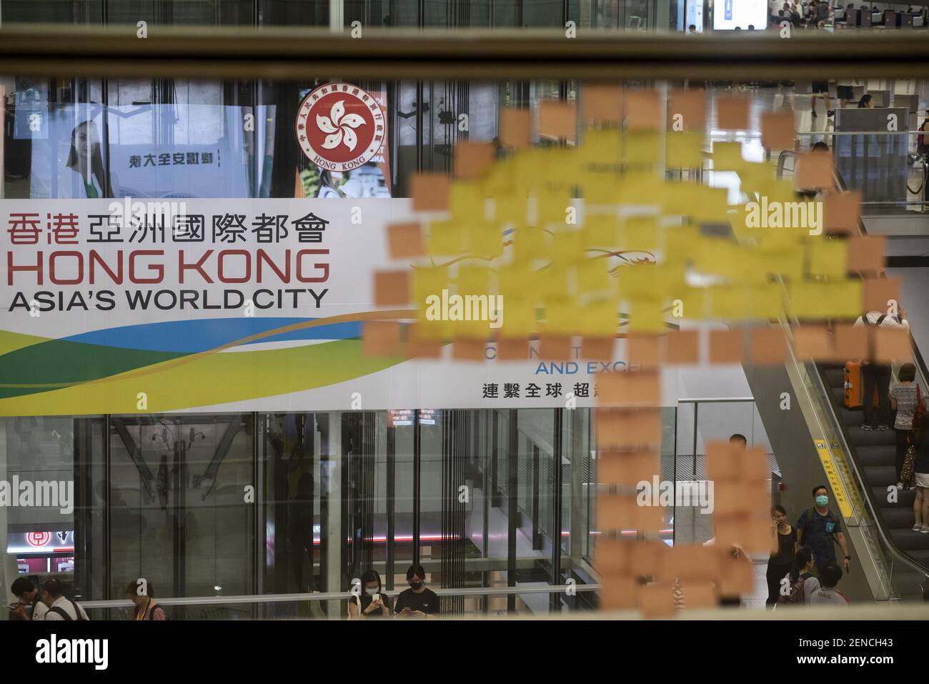 Protesters use sticky notes to form the shape of an umbrella, symbol ...