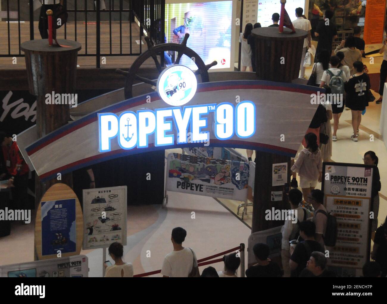 Customers view sculptures featuring cartoon character "Popeye the ...