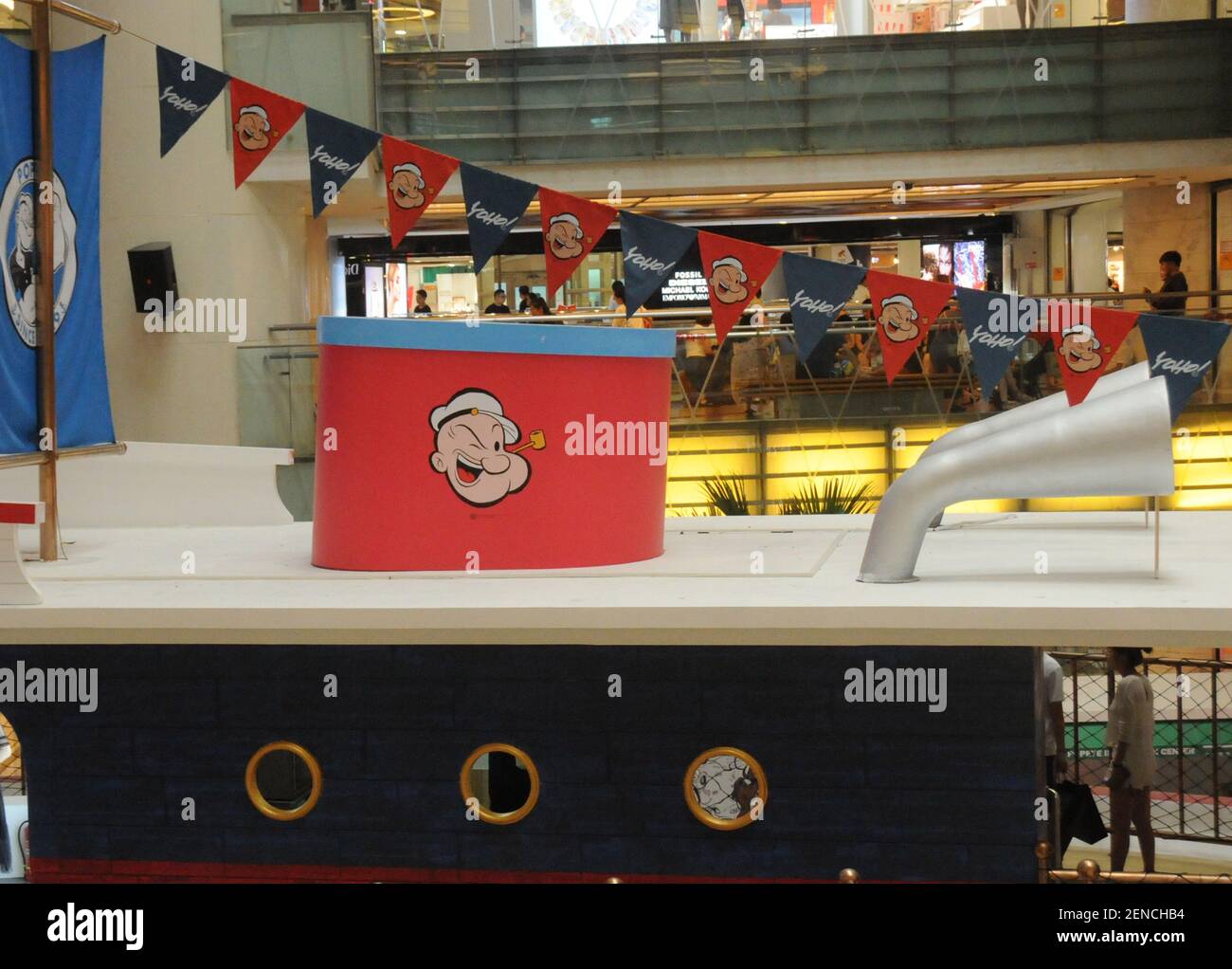 Customers view sculptures featuring cartoon character "Popeye the ...