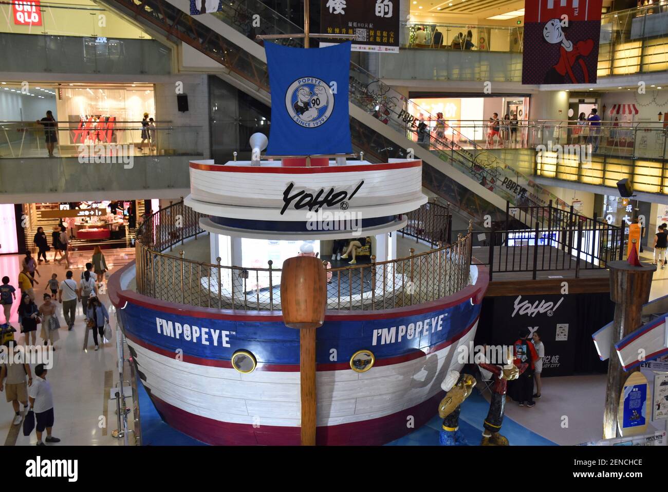 Customers view sculptures featuring cartoon character "Popeye the ...