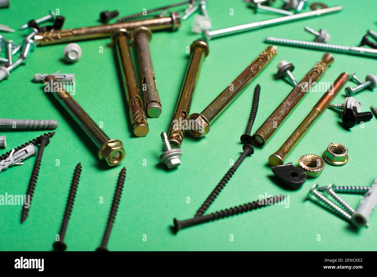 Green wood and silver screws hi-res stock photography and images - Alamy