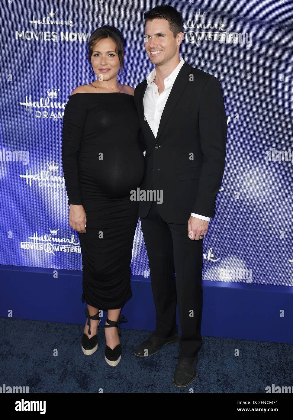 (L-R) Italia Ricci and Robbie Amell at the Hallmark Channel and ...