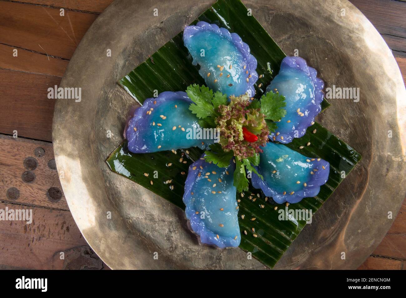 Kanom Gib Thai, rice dumpling with steamed mauve tea leaves. blue ...