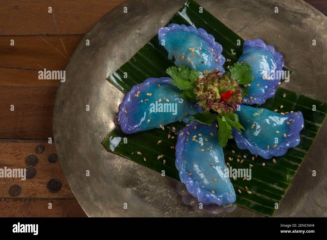 Kanom Gib Thai, rice dumpling with steamed mauve tea leaves. blue ...