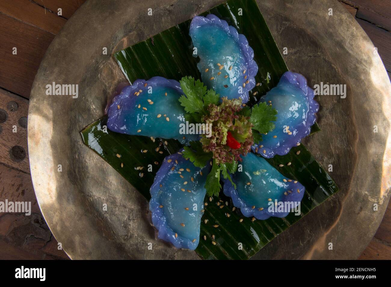 Kanom Gib Thai, rice dumpling with steamed mauve tea leaves. blue ...