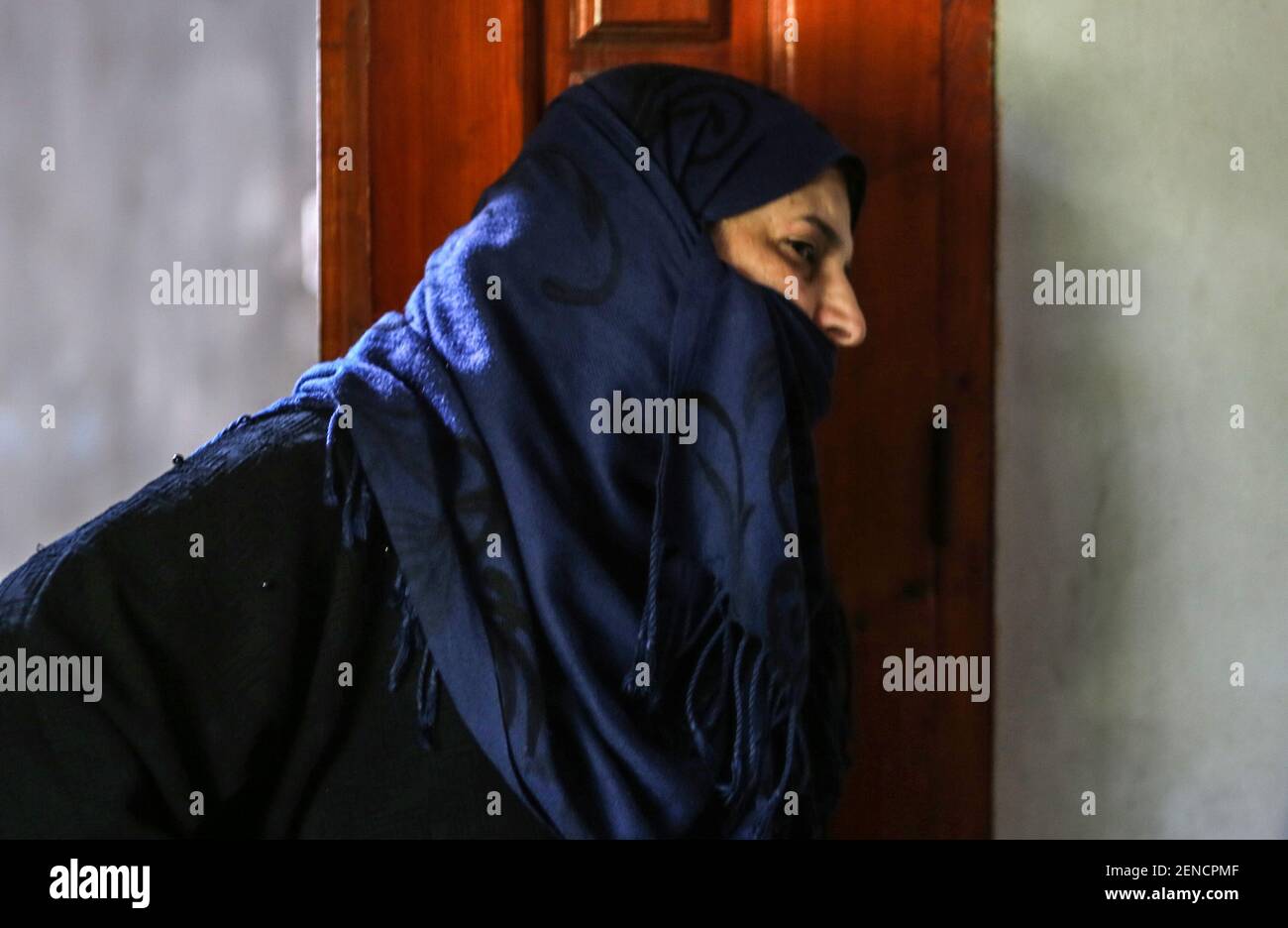 Relatives mourns of Ahmed al-Qarra, 23, during his funeral in town of ...