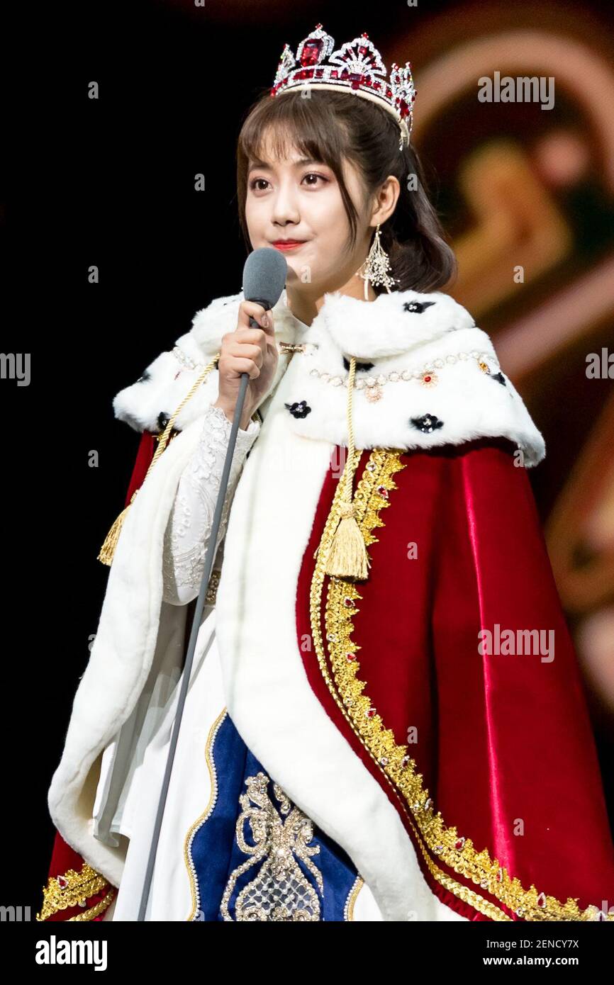 Winner Li Yitong of Chinese girl group SNH48 poses with her champion ...