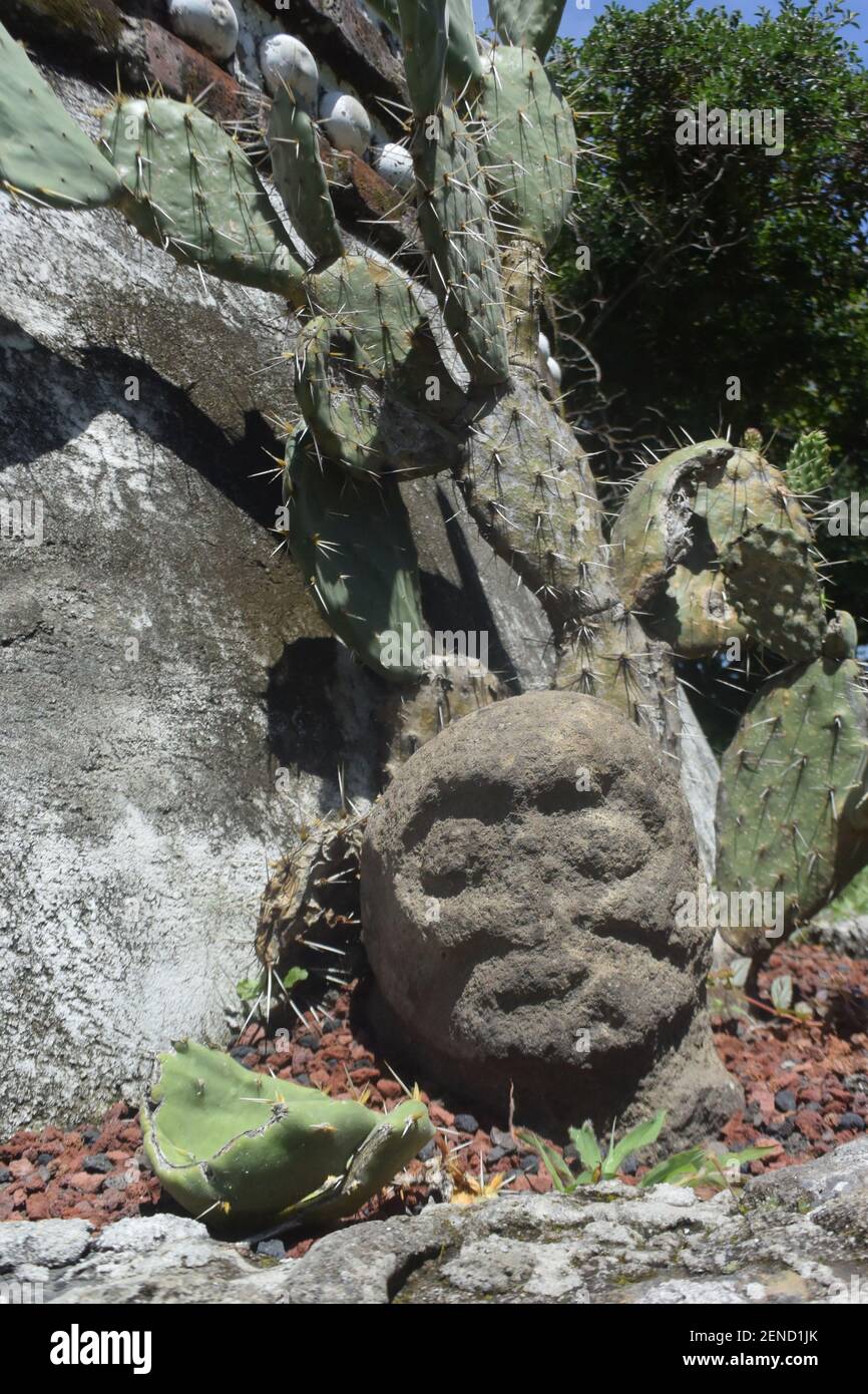 TEPOZTLAN, MEXICO - JULY 27: A stone figure seen outside of a Temazcal ...