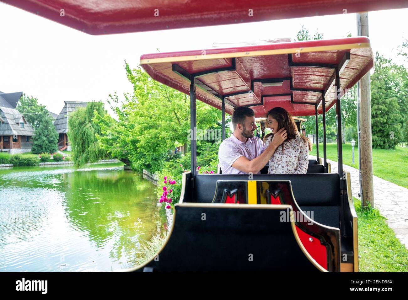 Two lucky people on a love train ride Stock Photo - Alamy