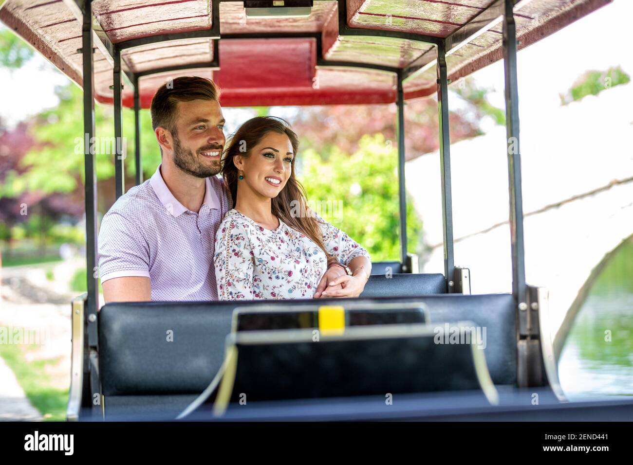 Cute couple making a perfect match, mini love train Stock Photo - Alamy