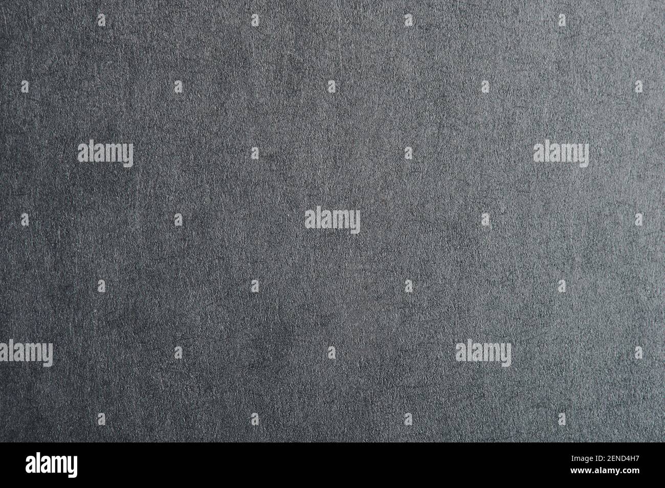 Pattern of gray paper sheet surface close up view. Black canvas ...