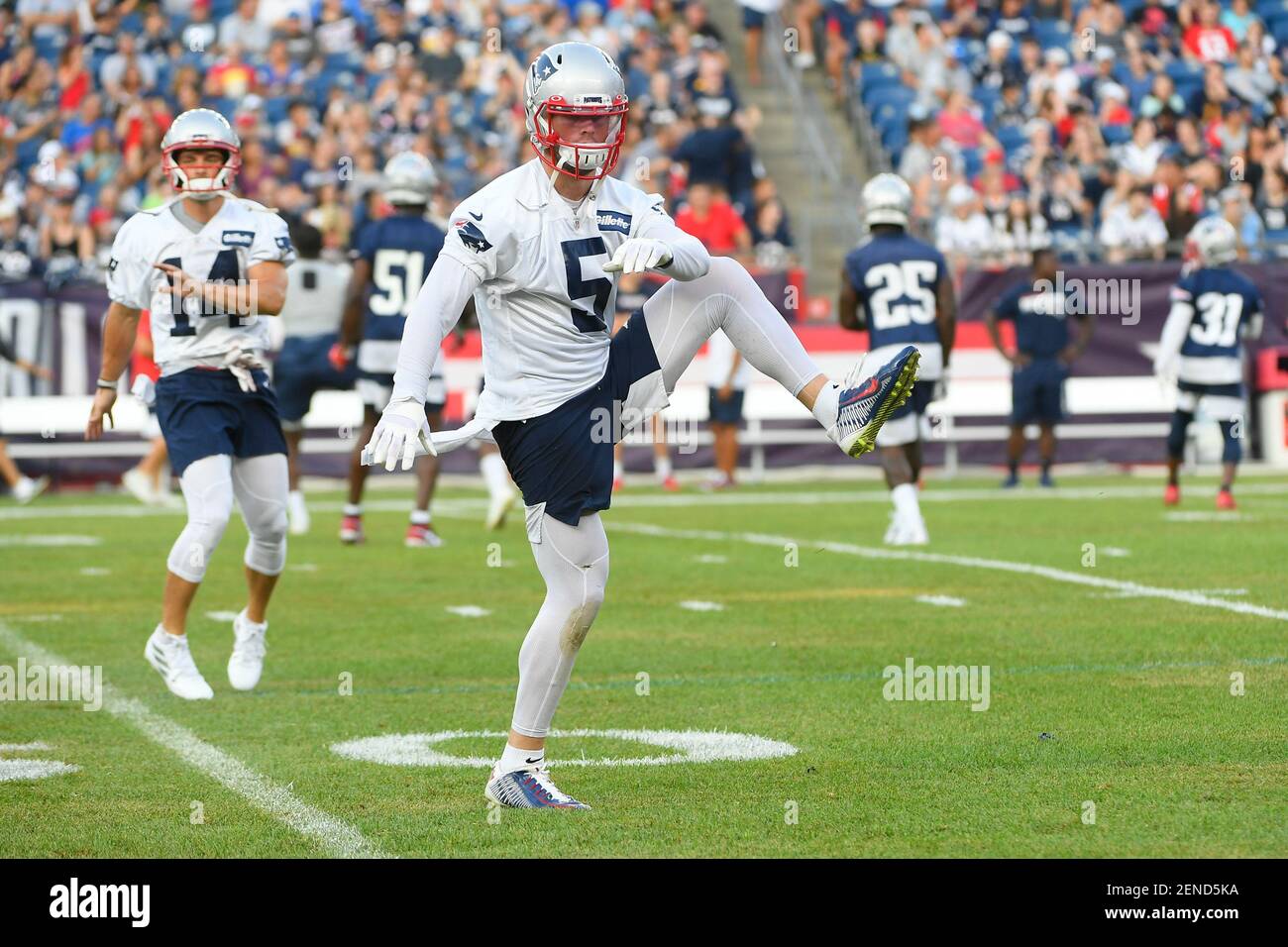 July 29, 2019: New England Patriots quarterback Danny Etling (5) warms ...