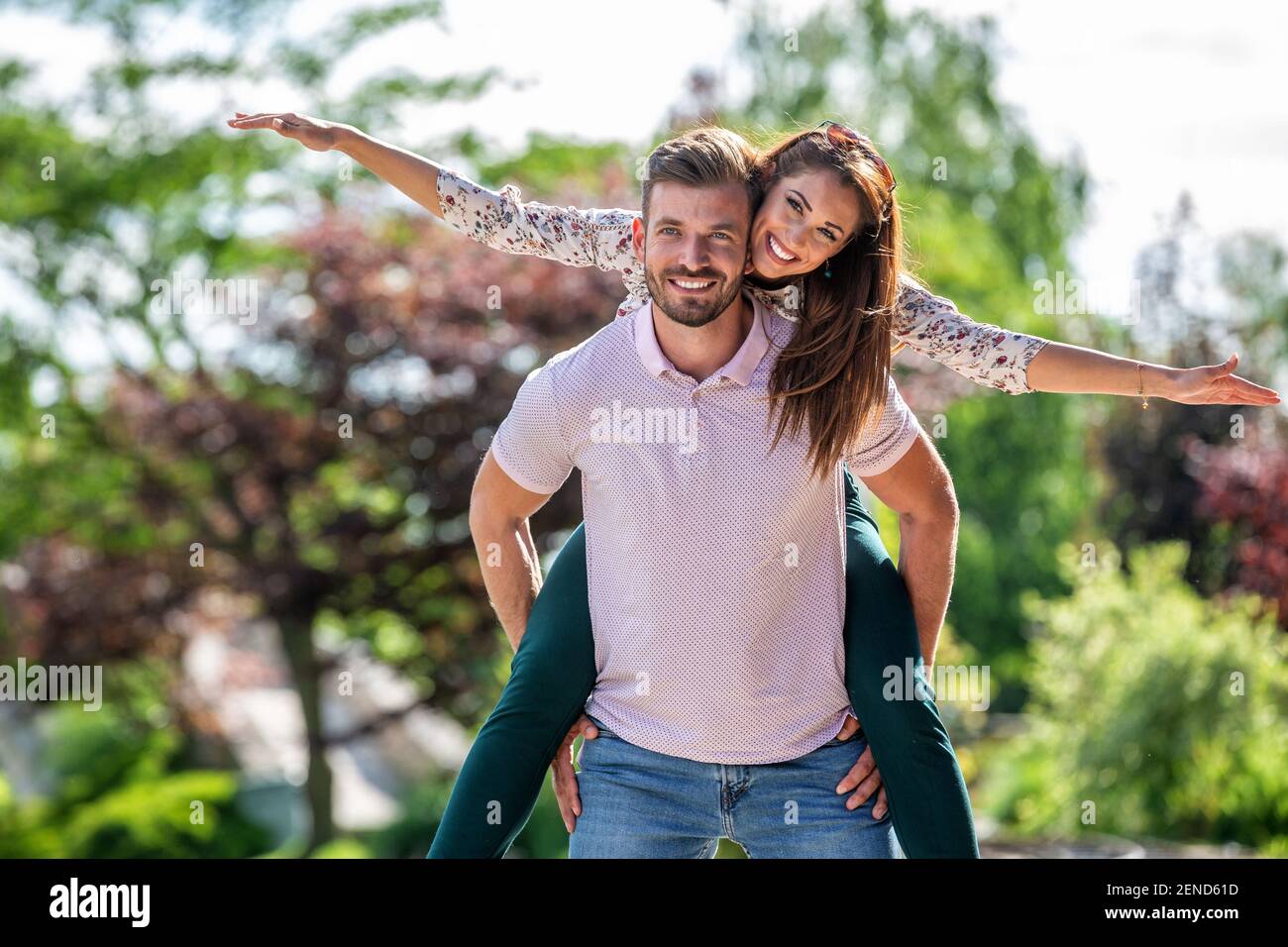 Couple in love goofing around and posing for pictures Stock Photo - Alamy